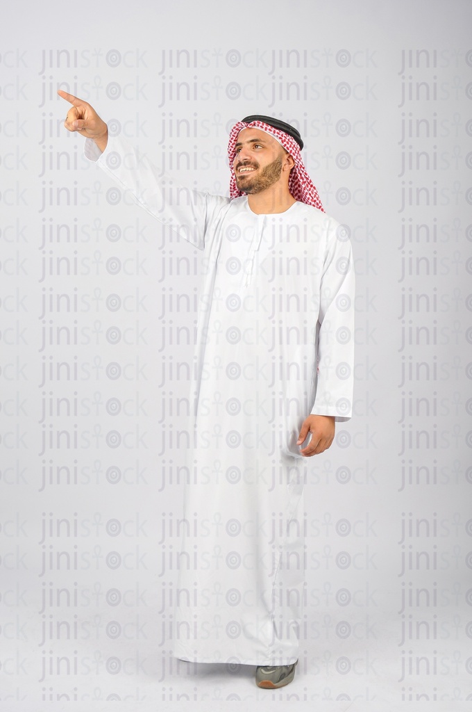 A khaliji man pointing at something | Jini Stock