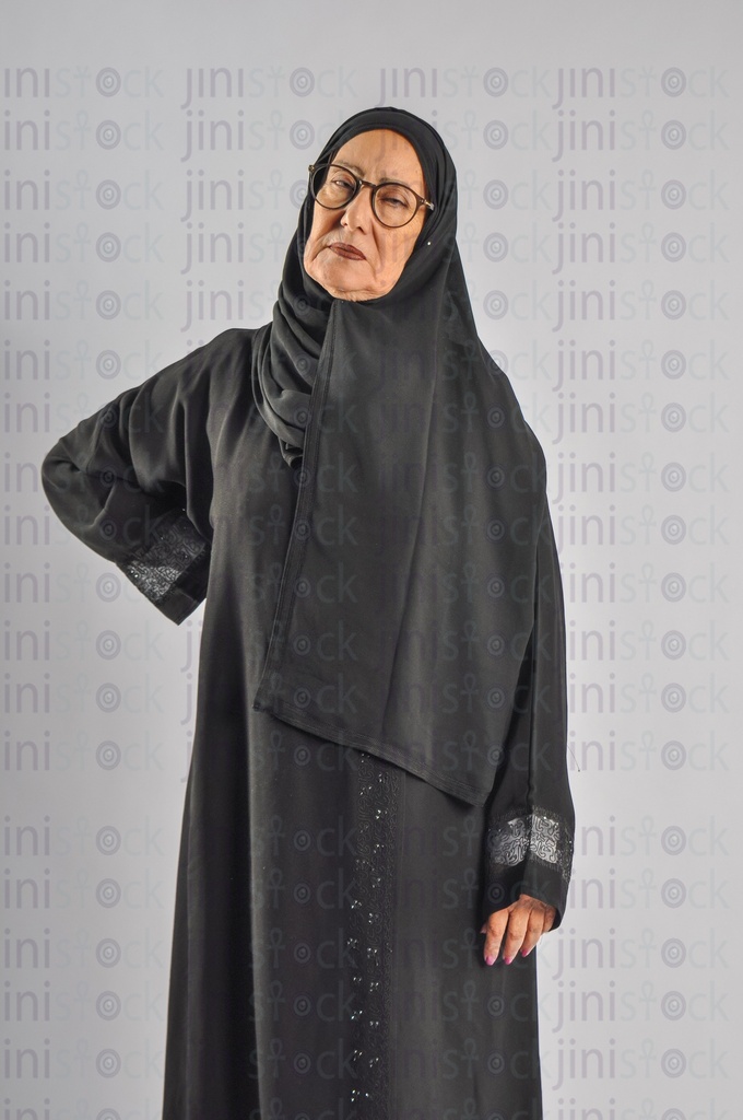 Saudi Arabian or Emirati woman or a woman from the Gulf has back pain ...