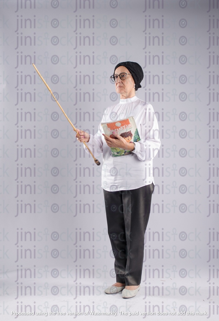 Old Egyptian woman Teacher or school principal | Jini Stock