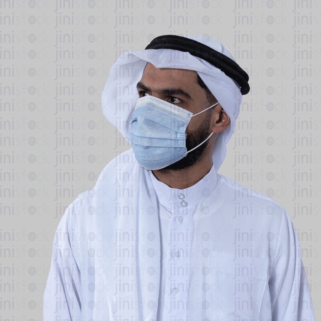 saudi khaliji man from gulf wearing a mask | Jini Stock