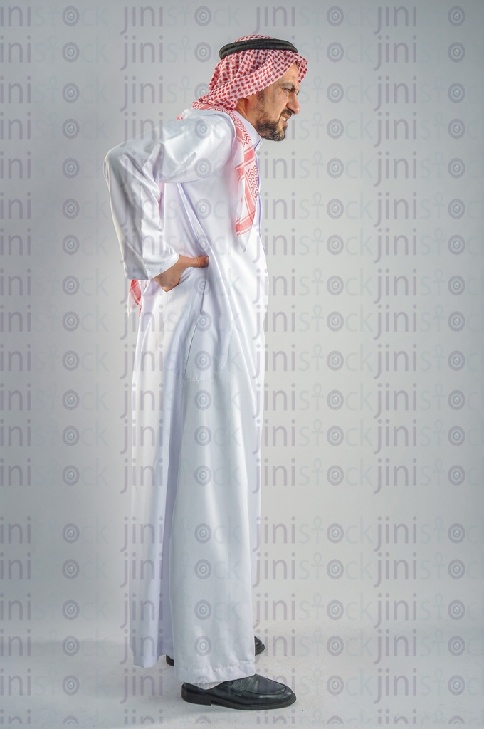 Saudi Arabian or Emirati man or a man from the Gulf has back pain ...
