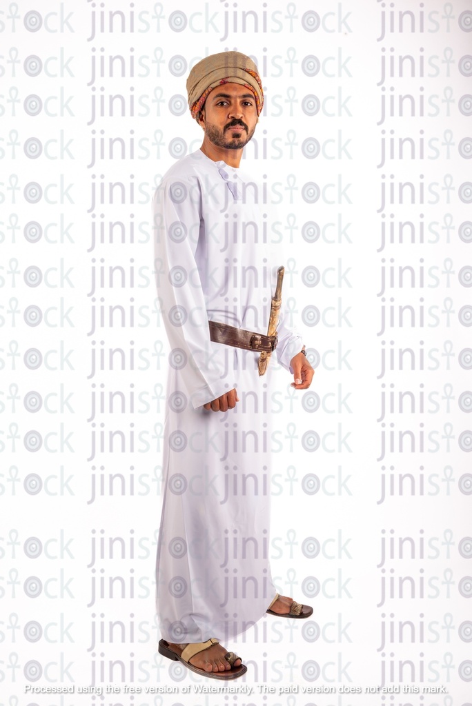 omani khaliji arab man from gulf man standing proud | Jini Stock