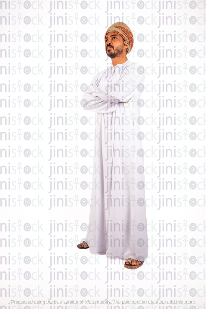 Omani arab khaliji man from gulf standing proud | Jini Stock