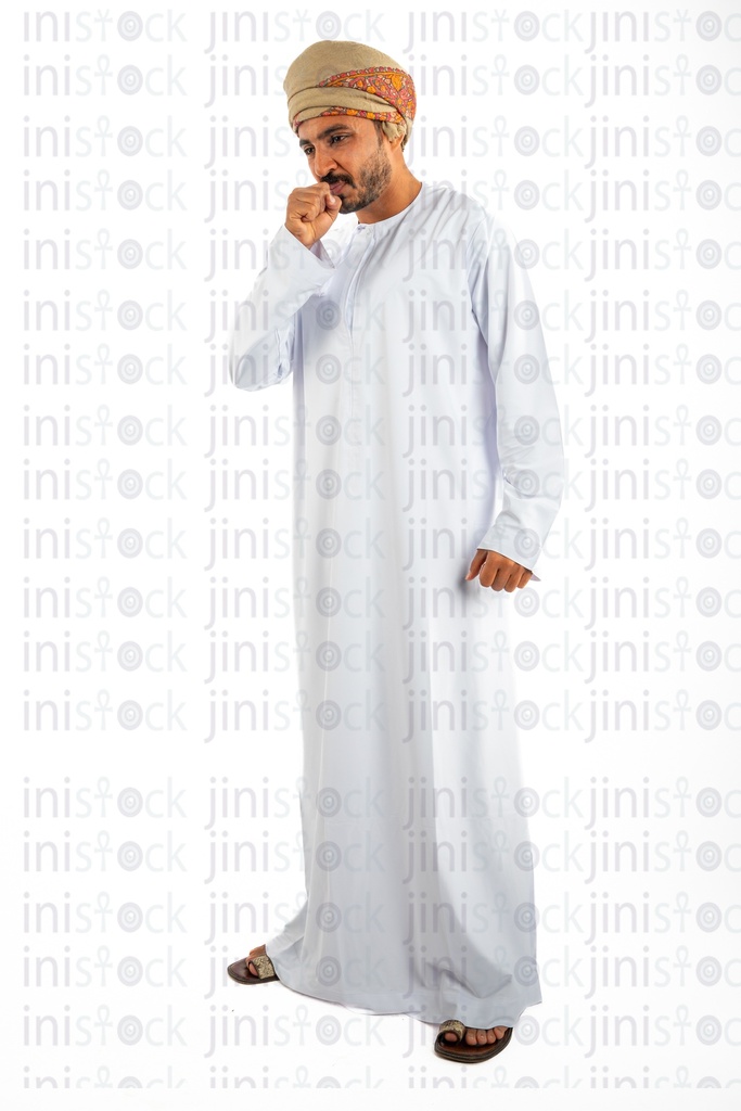 Omani arab khaliji man from gulf coughing with flu or cold | Jini Stock