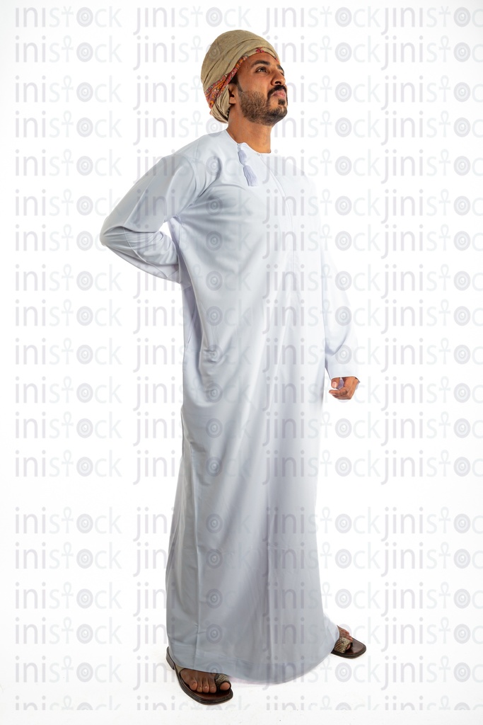 Omani arab khaliji man from gulf with backache or lower back pain ...