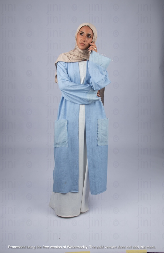 khaliji arab saudi woman from gulf standing thinking and talking on the ...