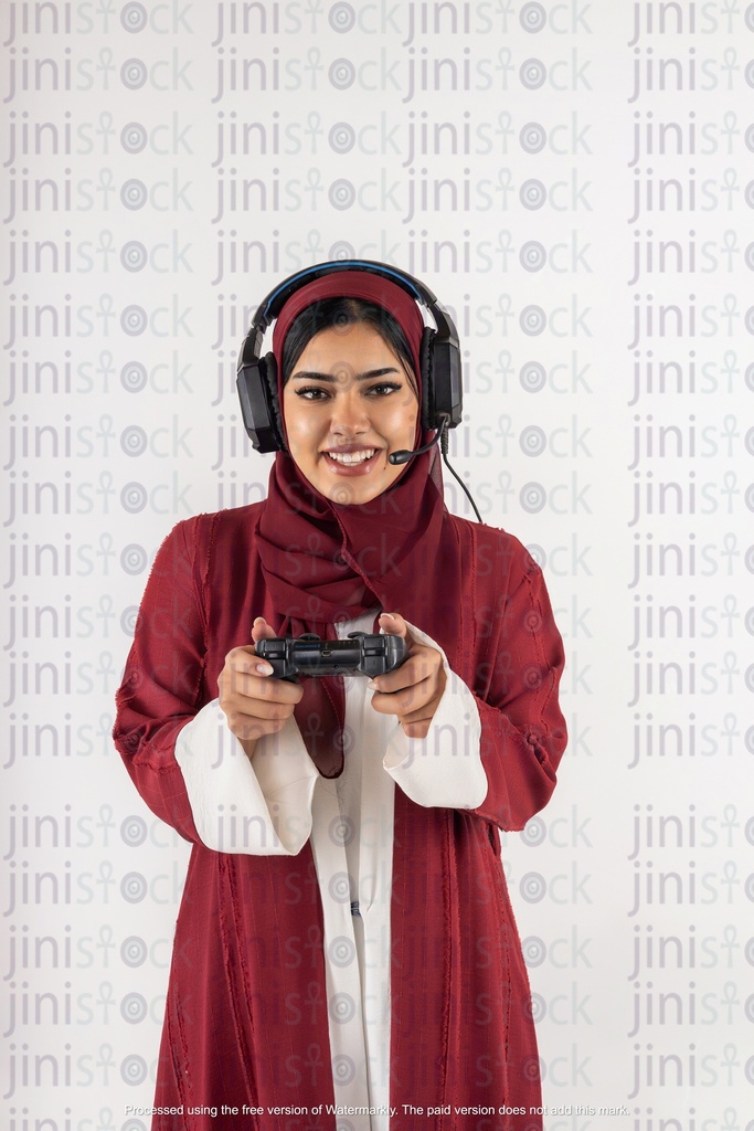 a stock image of an online games khaliji Saudi girl from gulf with isolated background | Jini Stock