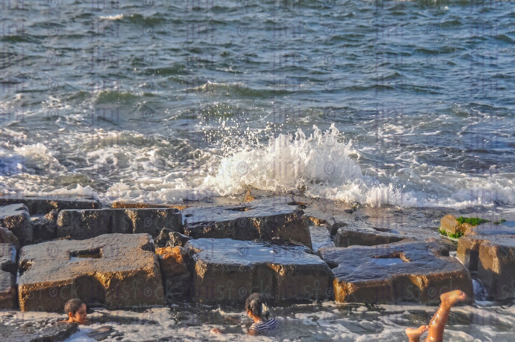 A beach, water splash and waves in Alexandria- Alexandria Corniche ...