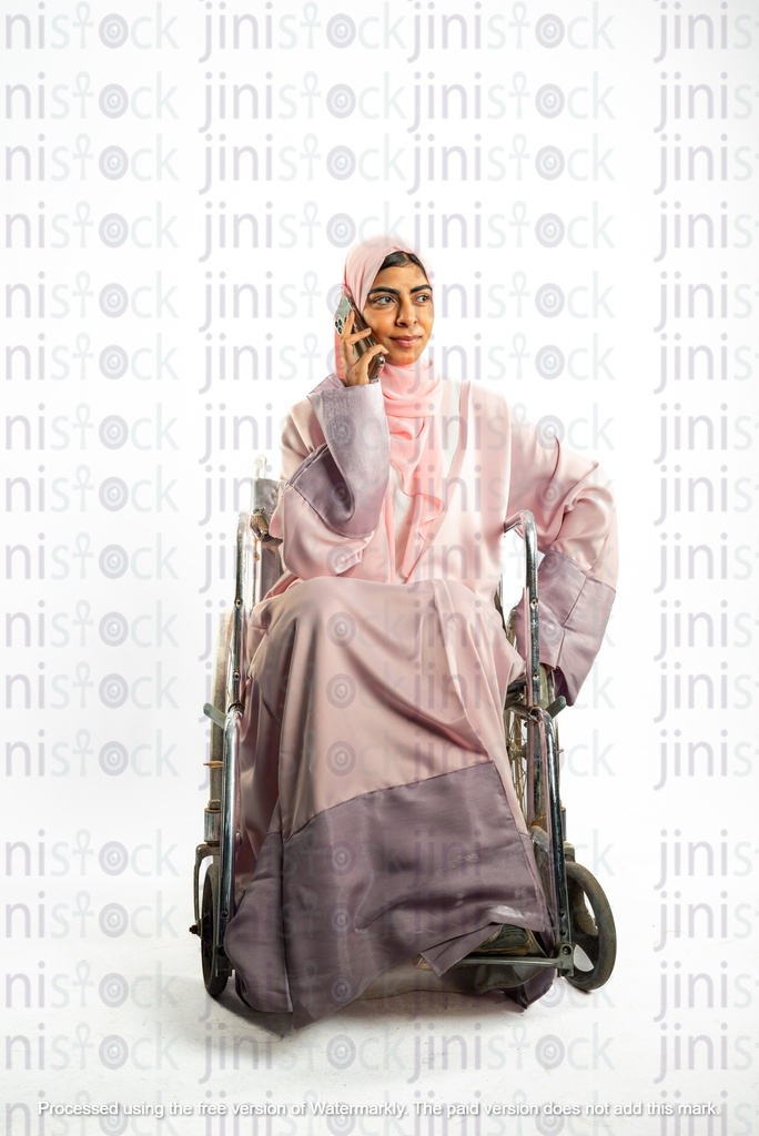 saudi khaliji woman from the gulf on a wheel chair talking on th e ...