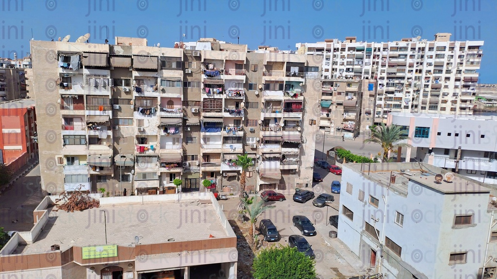 High angle of buildings and a street in Port Fouad in Port Said Egypt ...
